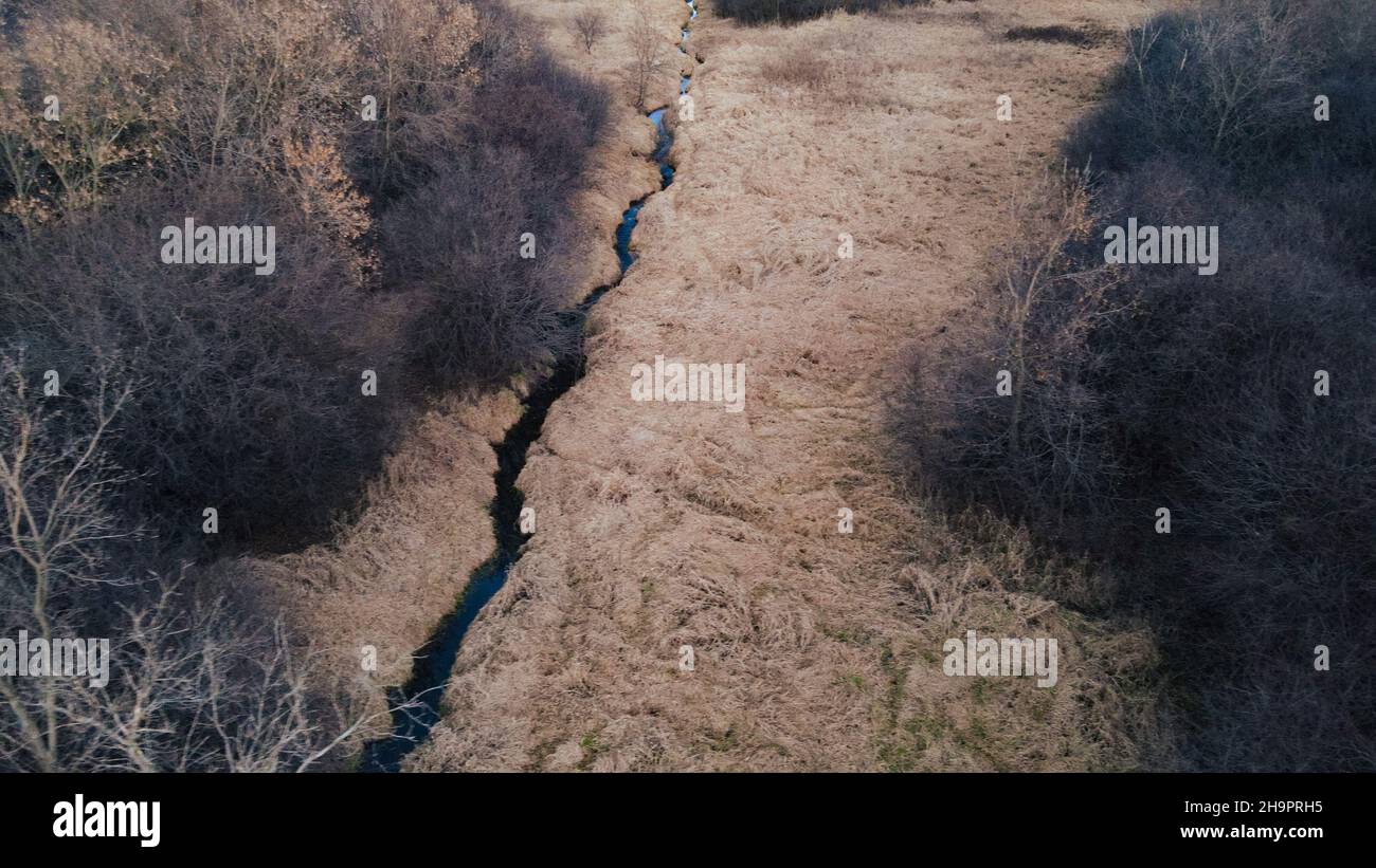 Following the blue stream through rural wisconsin farmland Stock Photo ...
