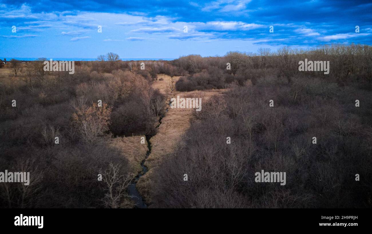 Following the blue stream through rural wisconsin farmland Stock Photo ...