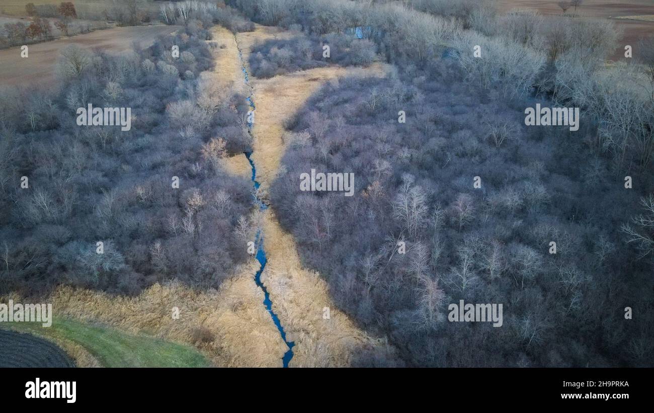 Following the blue stream through rural wisconsin farmland Stock Photo ...
