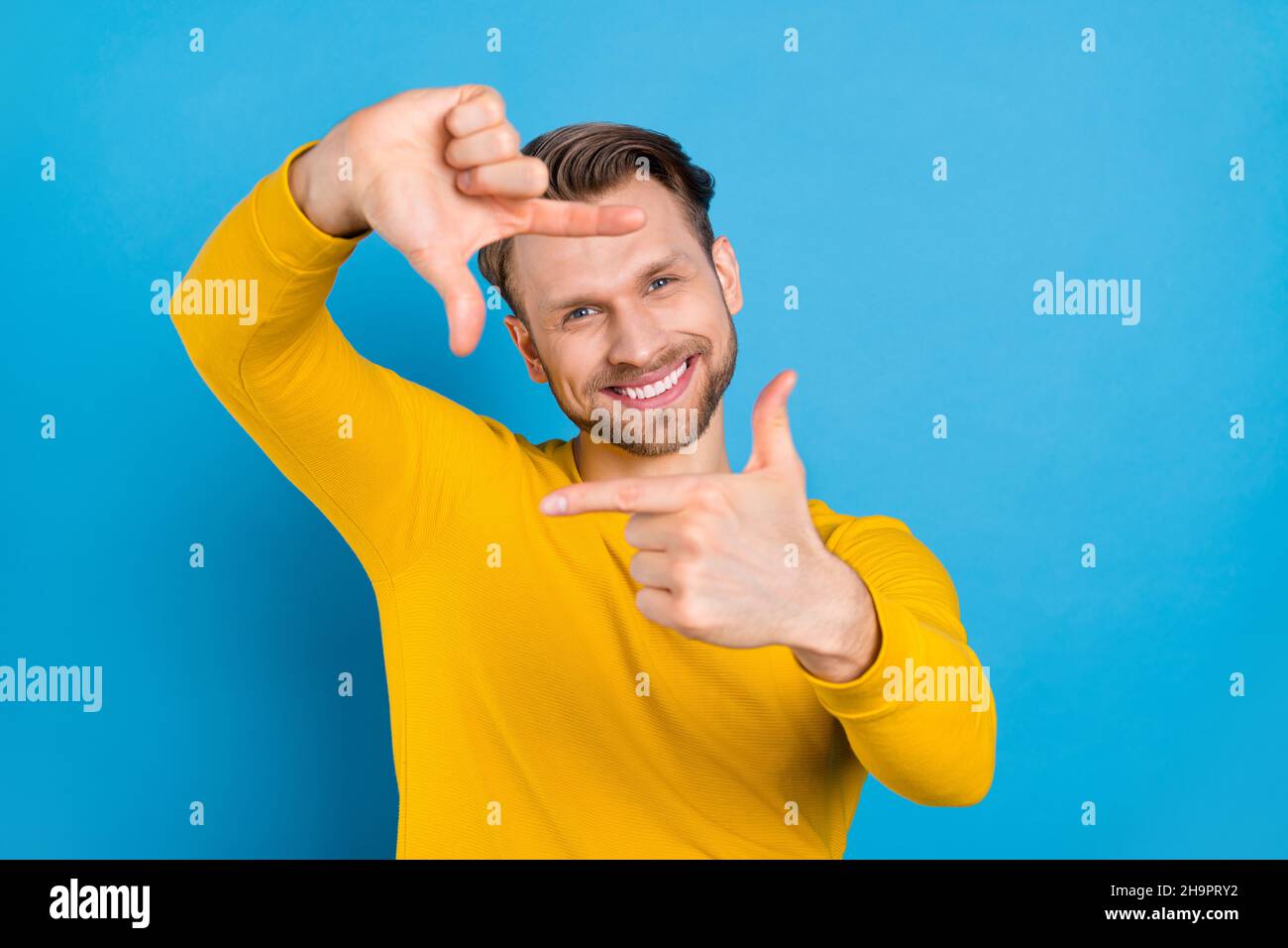 Photo portrait of man taking photo showing cadre frame isolated on ...