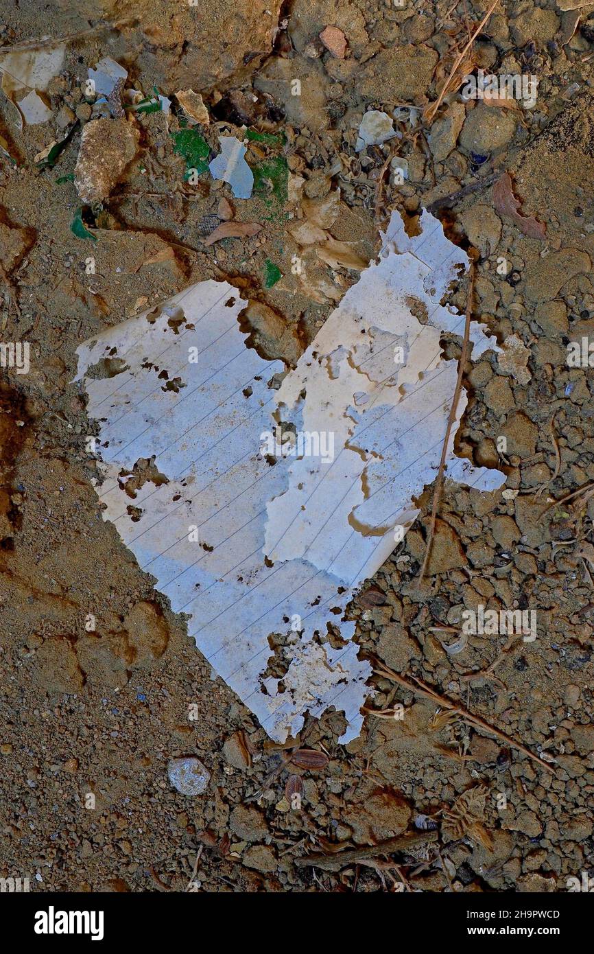 Tattered notebook pages in the shape of a heart at the bottom, paper ...