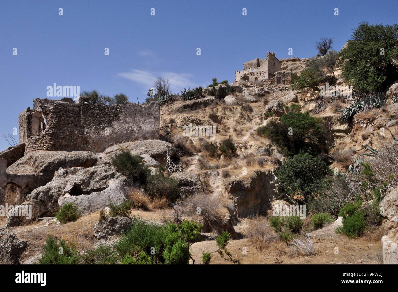 Abandoned village of El Marchalico Vinicas, Ruins on the hillside, Lost ...