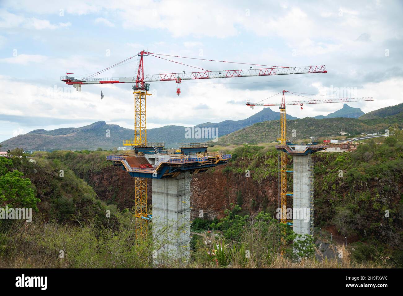 Construction site of bridge with crane across the Grand River of North ...
