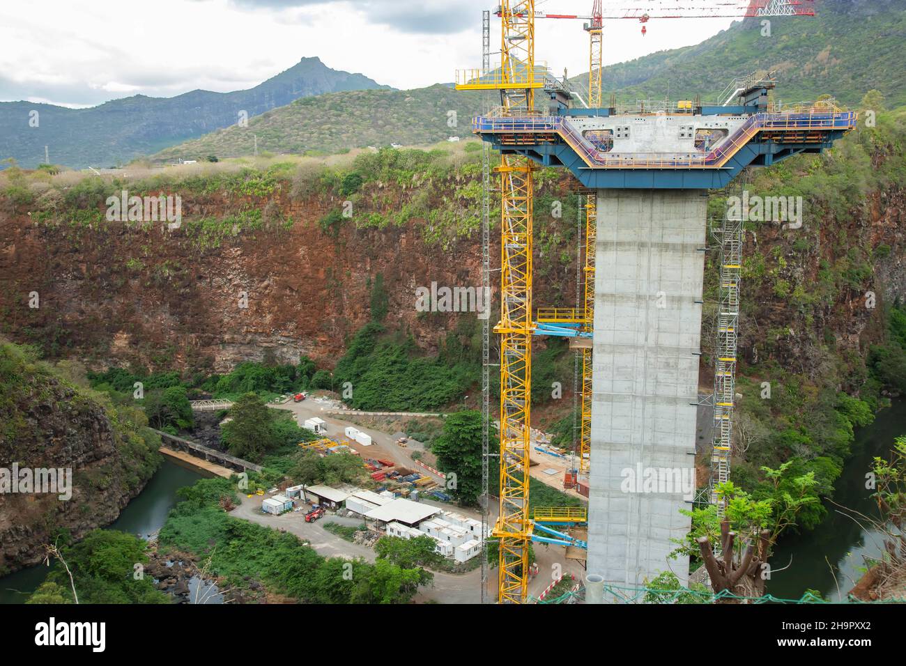 Construction site of bridge with crane across the Grand River of North ...