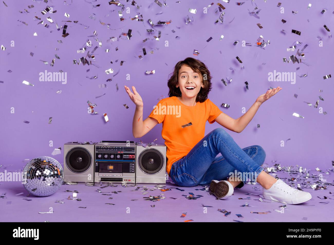 Full length body size photo happy boy sitting near tape recorder disco ...