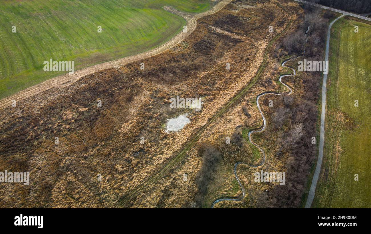 Rural Landscapes with Curved Stream with nature paths Stock Photo - Alamy