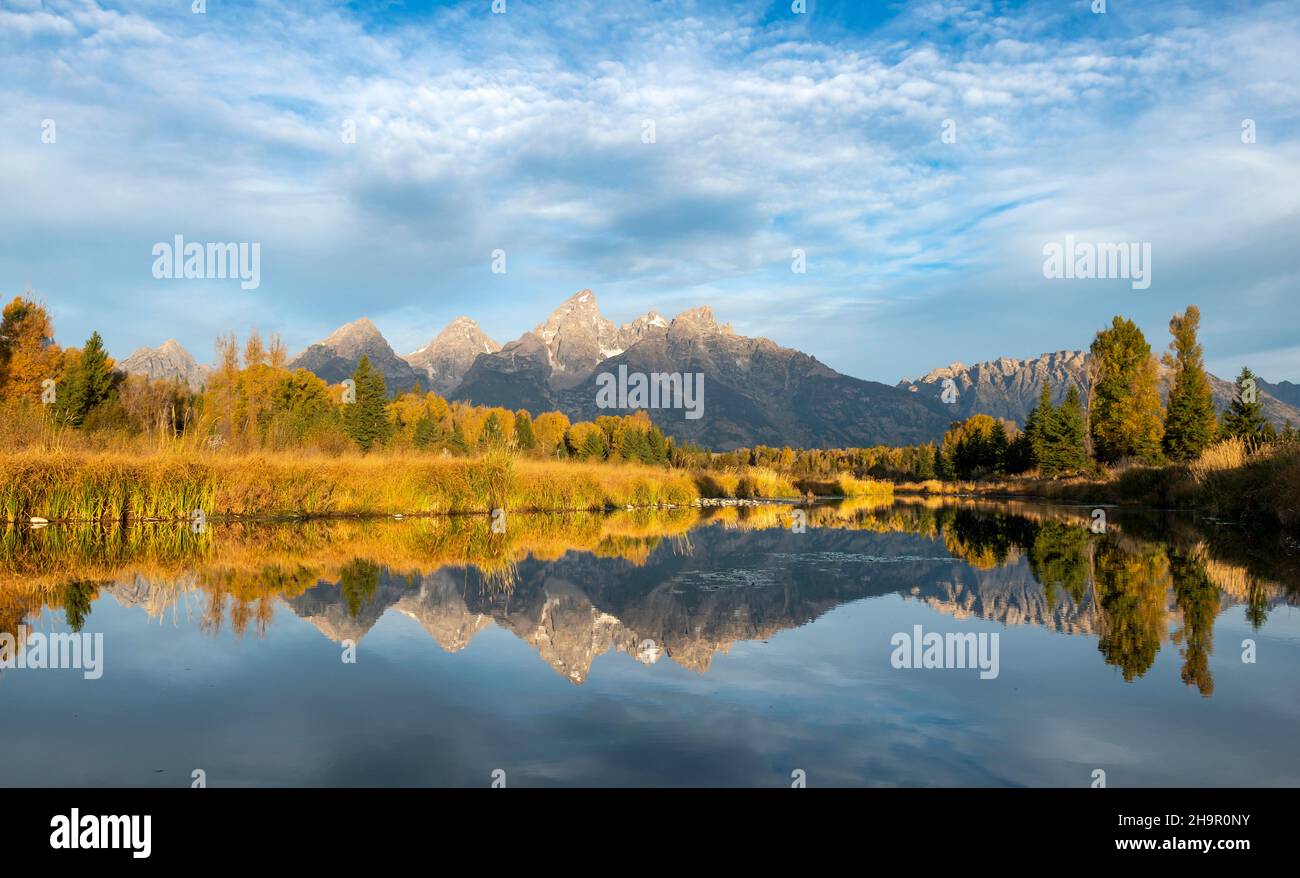 Autumn landscape with Grand Teton Range mountains, in morning light ...