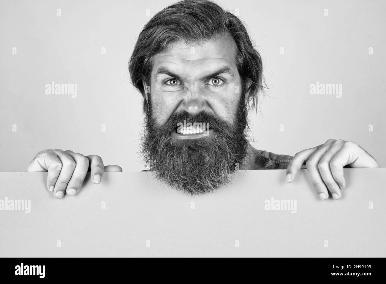 feel the anger. copy space paper sheet. mature bearded male. place your ...