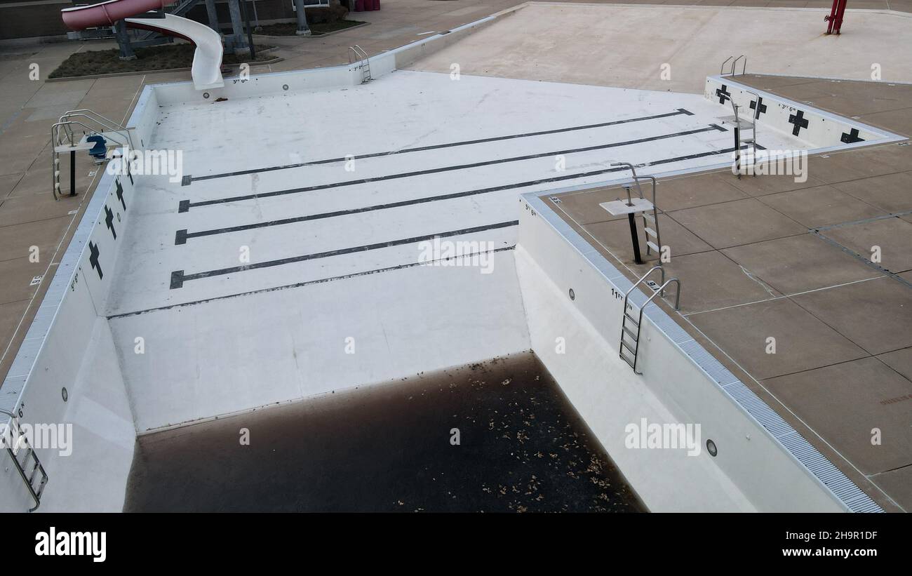 Inside look of local community pool during autumn Stock Photo - Alamy