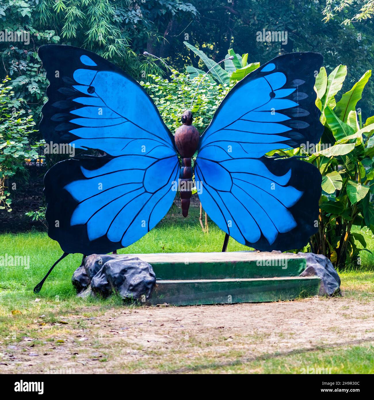 Artificial butterfly model in a park Stock Photo - Alamy