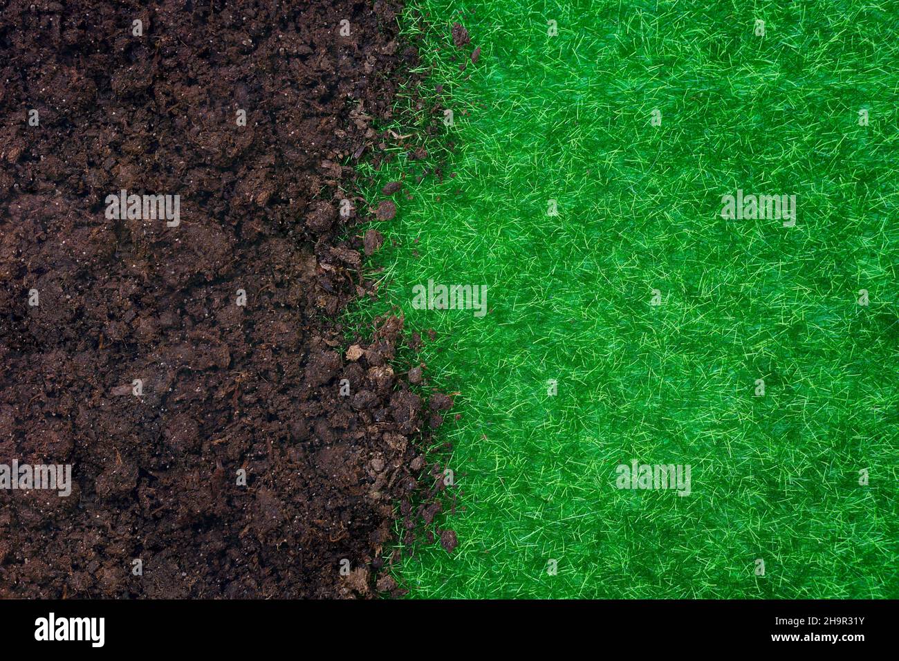 Background made of green grass and fertile soil Stock Photo - Alamy