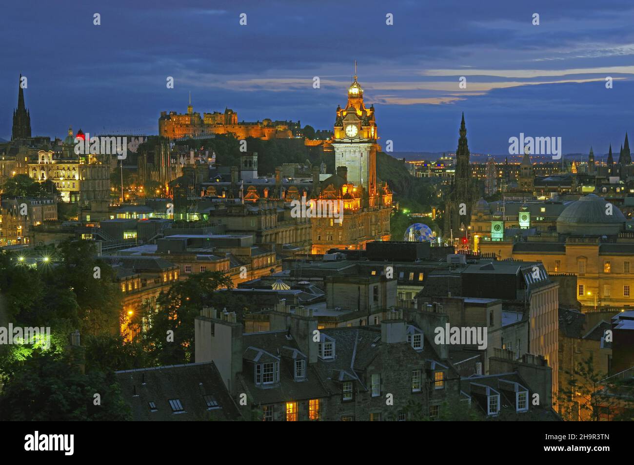 Balomoral Hotel and parts of Edinburgh Old Town, blue hour, Scotland ...
