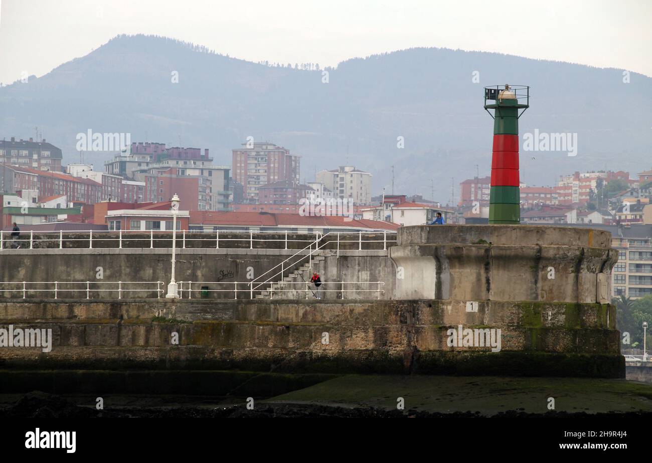 Beautiful shot of a beacon and a mountain in the background during the ...