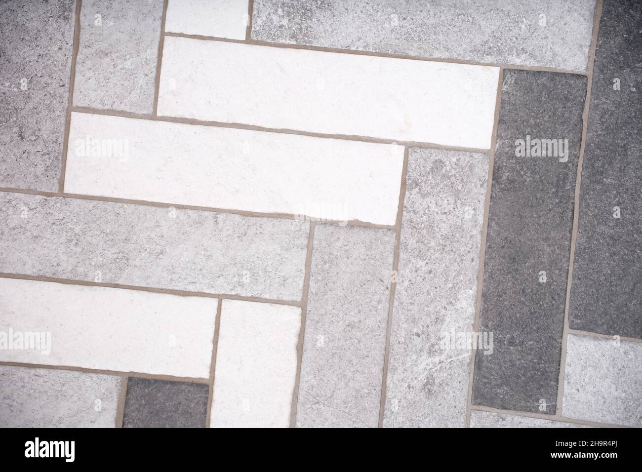 Rectangular floor tiles in white and gray tones Stock Photo - Alamy