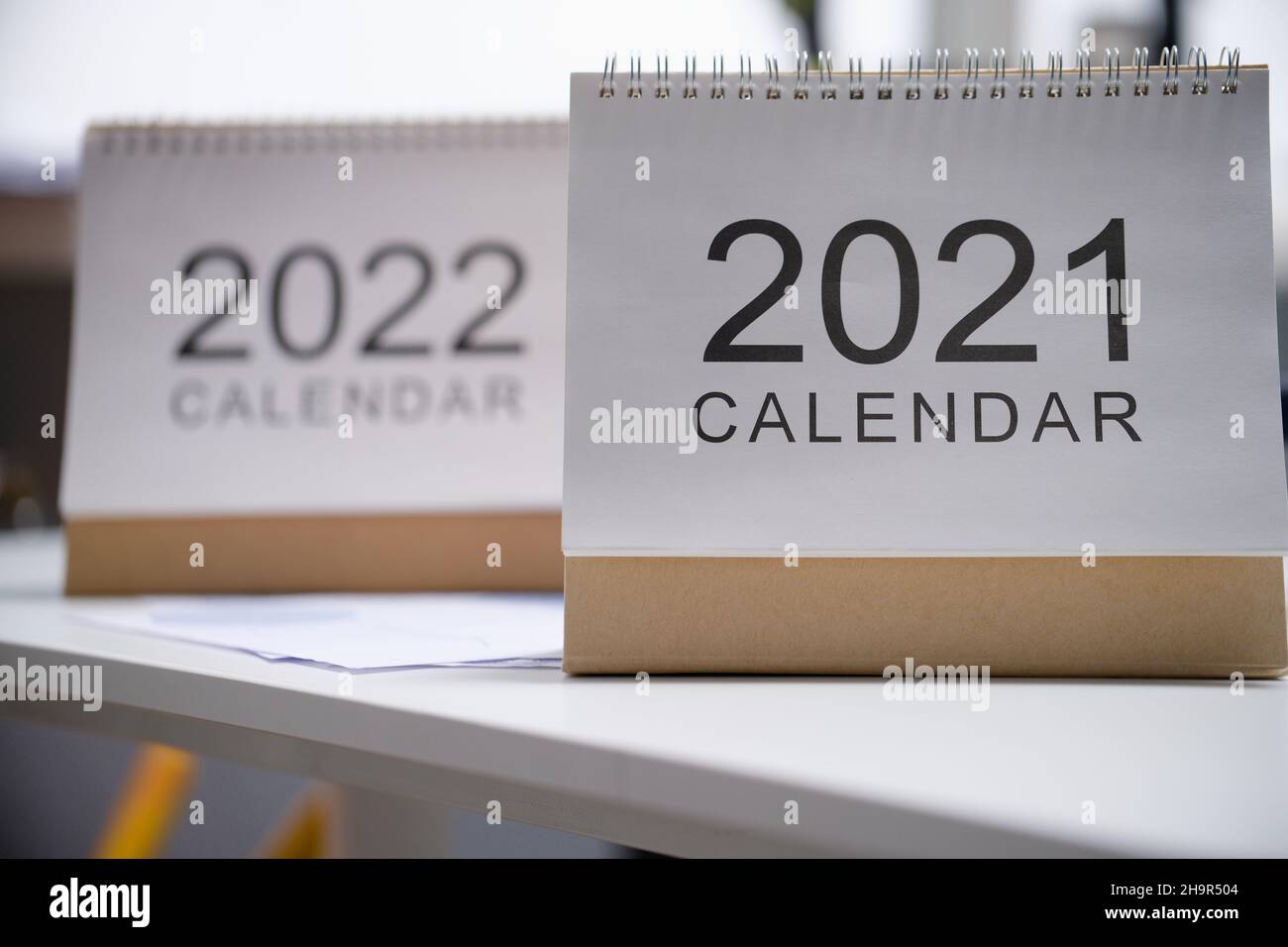 Calendar 2021 and 2022 on table closeup. Coming new year and planning ...
