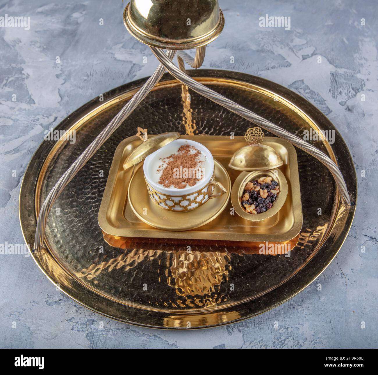 Turkish Salep in a copper tray set. Sahlep drink with cinnamon and ...