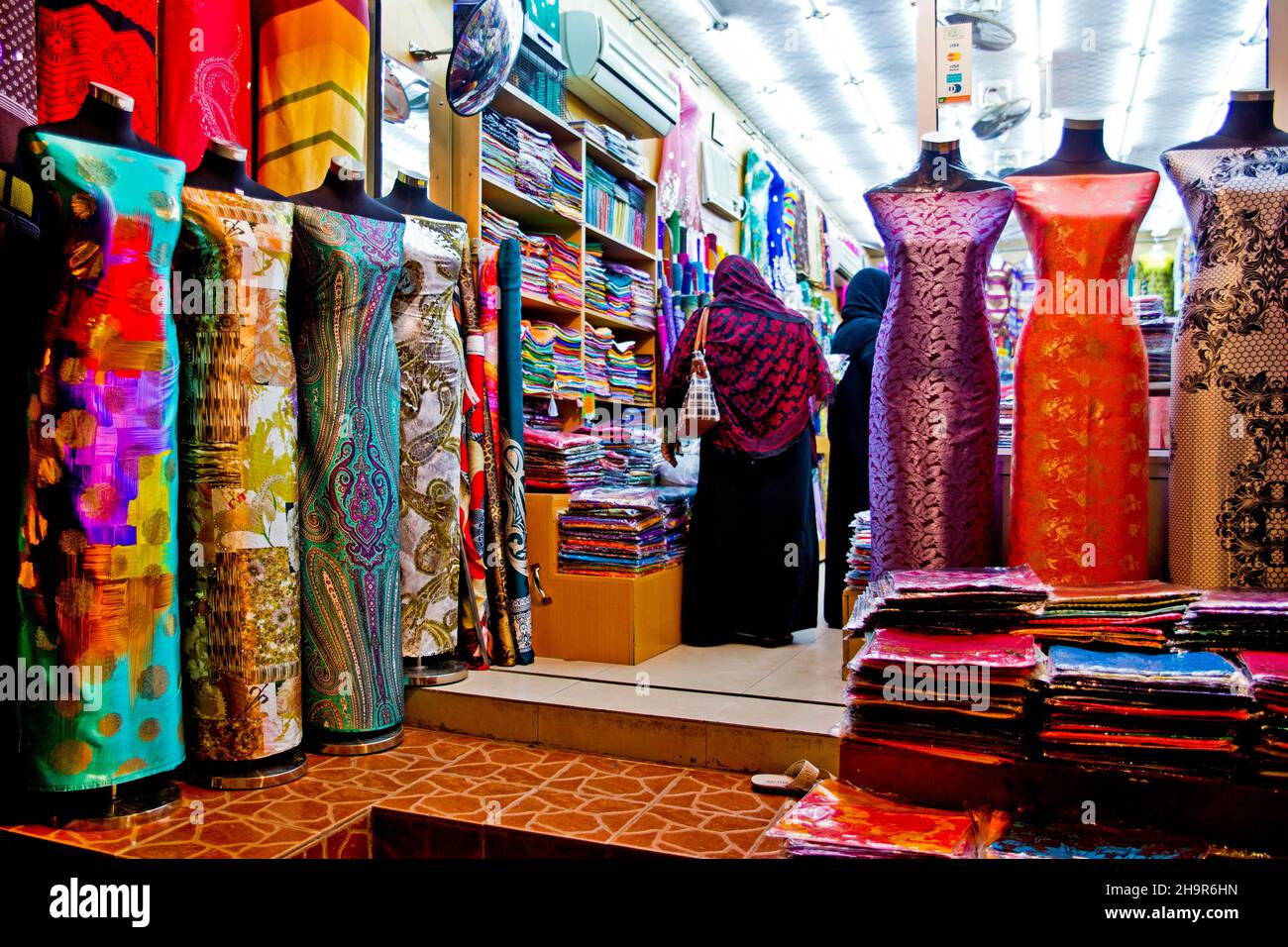 Splendid garments in the souq, Muscat-Mutrah, Muscat, Oman Stock Photo ...