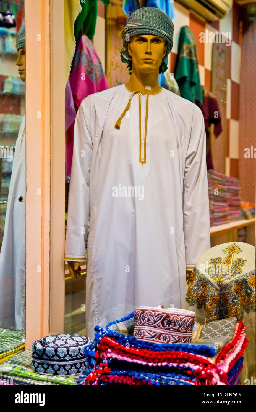 Traditional garments in the souq with headgear, a cashmere shawl, the ...