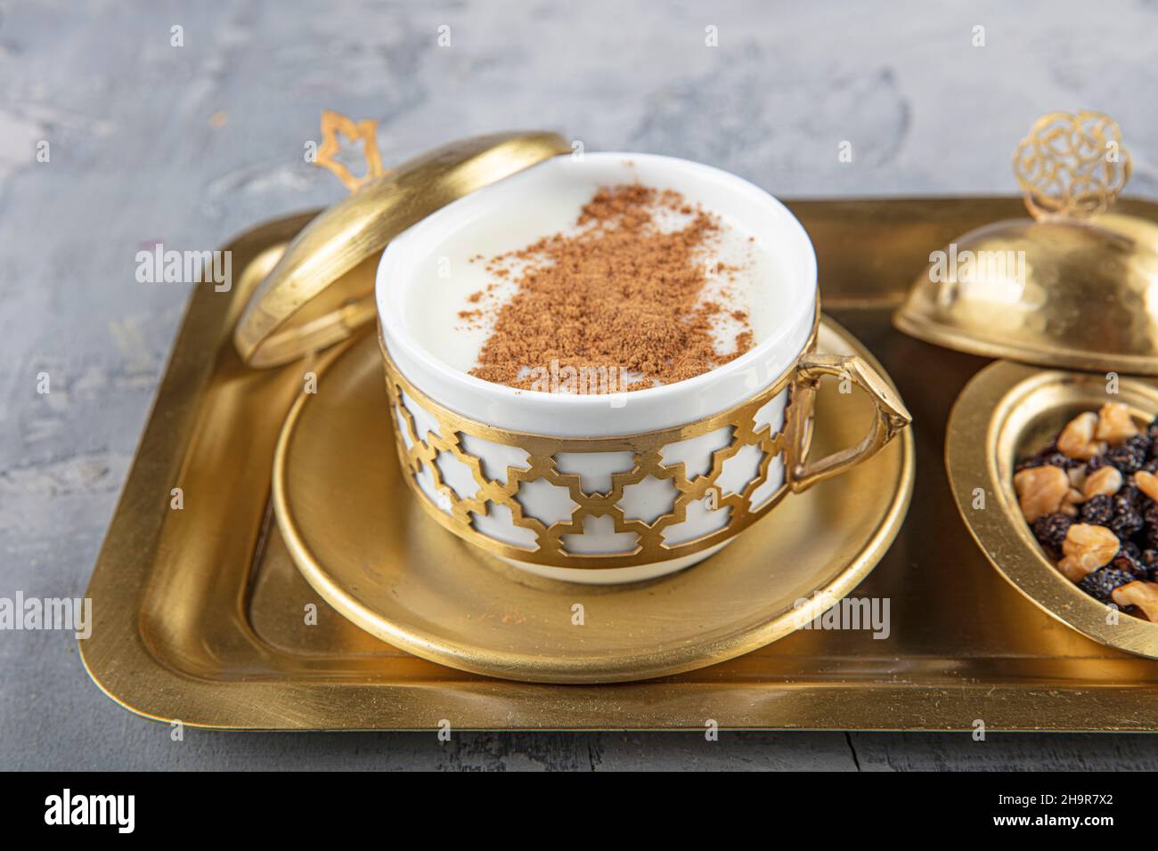 Turkish Salep in a copper tray set. Sahlep drink with cinnamon and ...
