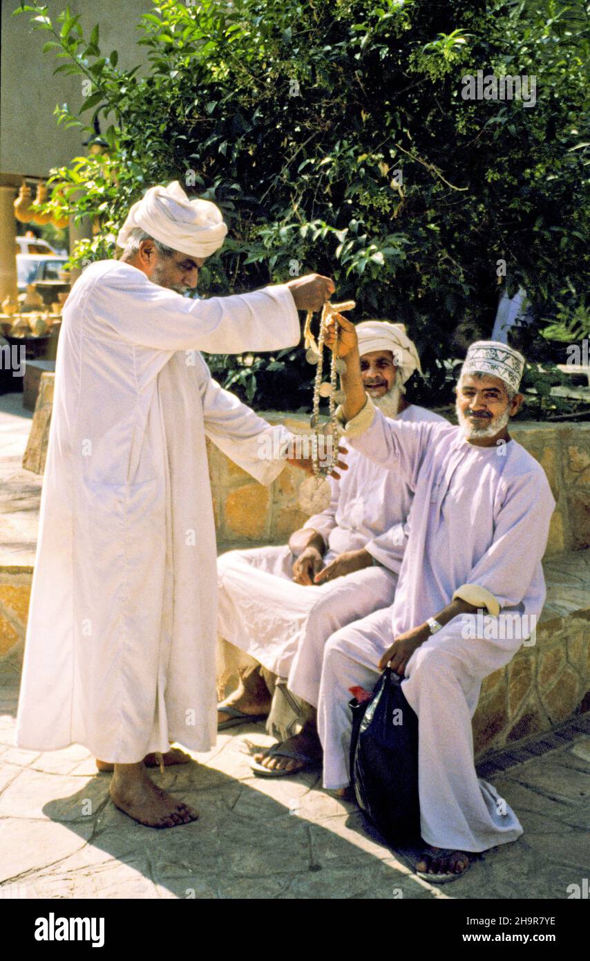 Omani people three men hi-res stock photography and images - Alamy