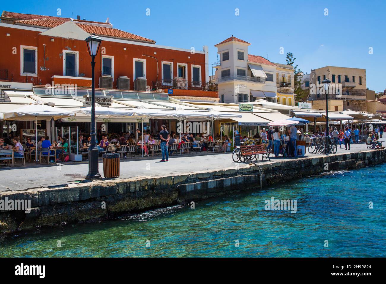 Cafes and restaurants at the harbour, Chania harbour town, Crete ...