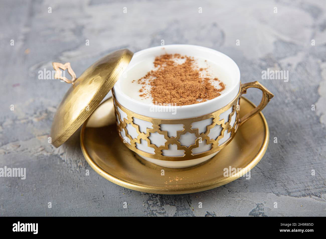 Turkish Salep in a copper tray set. Sahlep drink with cinnamon and ...