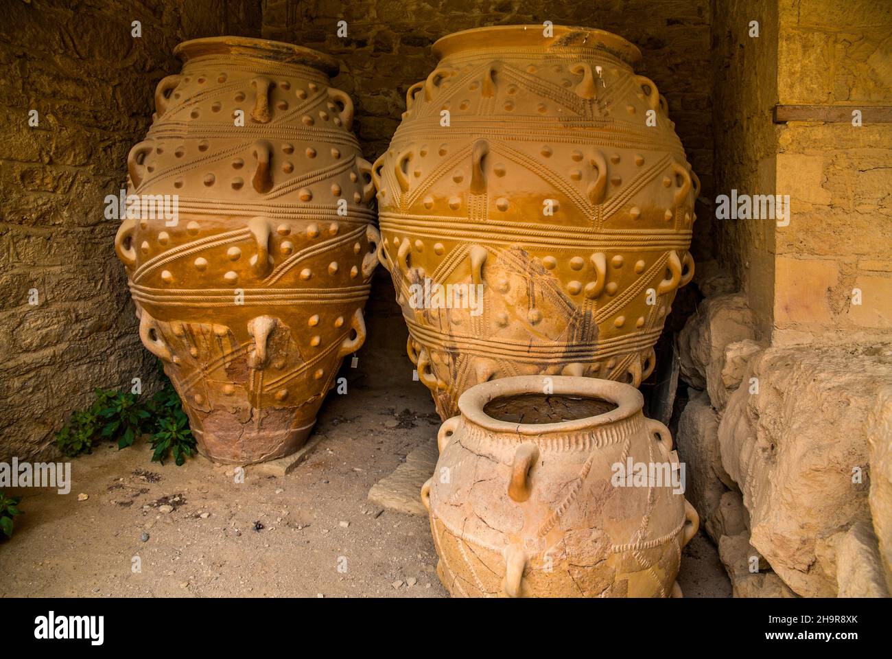 Pithoi, jar-like storage containers for oil, wine, Minoan palace of ...