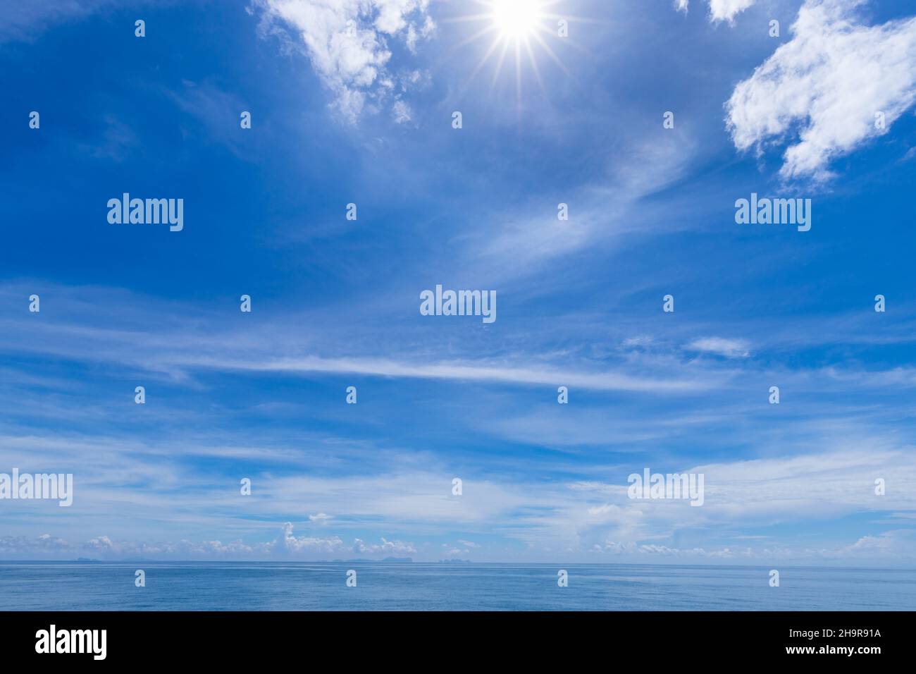 Blue sky horizon background with clouds on a sunny day seascape ...