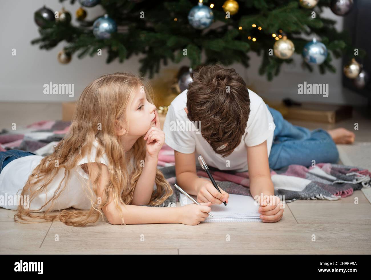 A boy child writing a postcard hi-res stock photography and images - Alamy