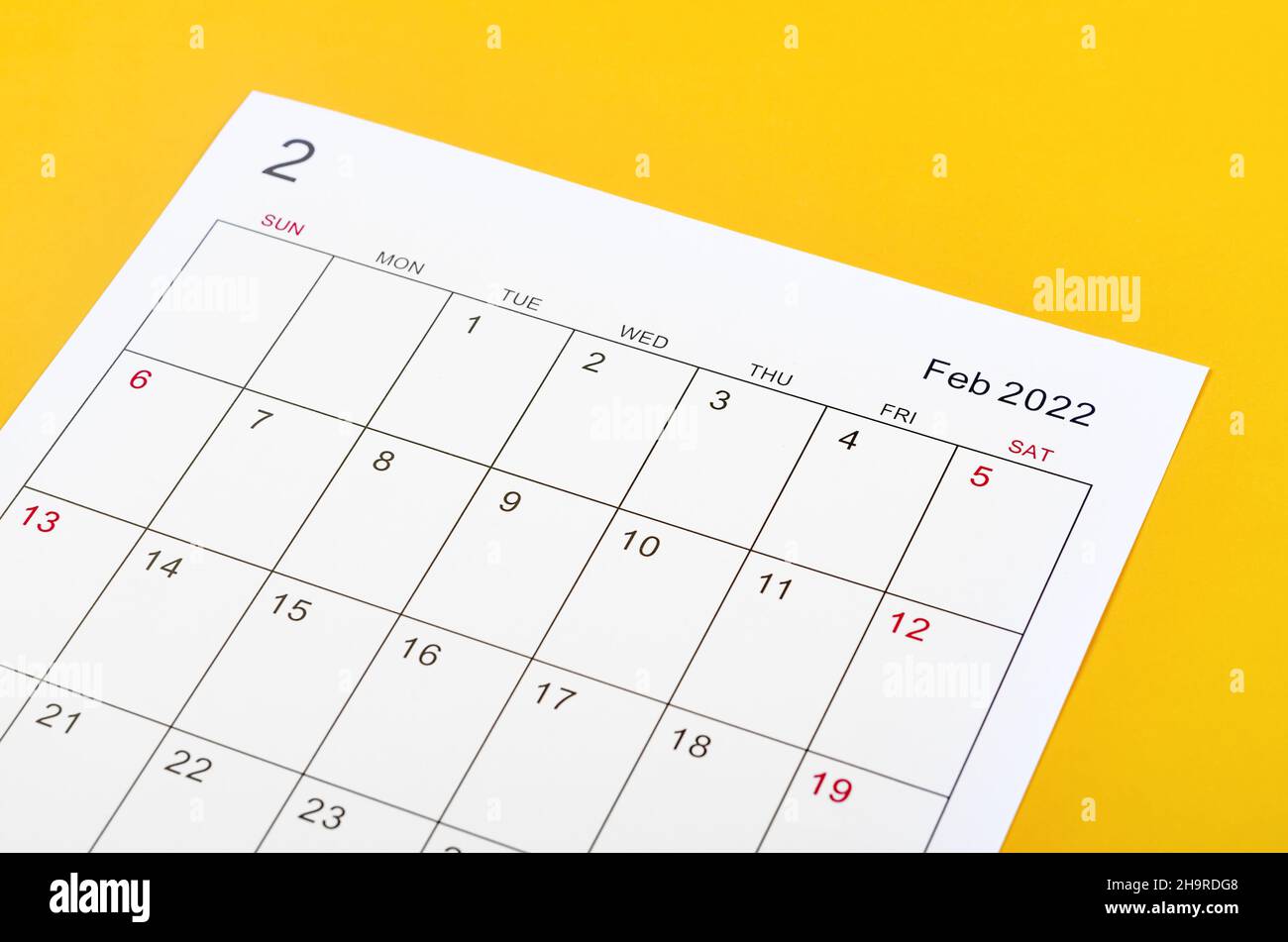 Close up February 2022 calendar sheet on yellow background Stock Photo ...