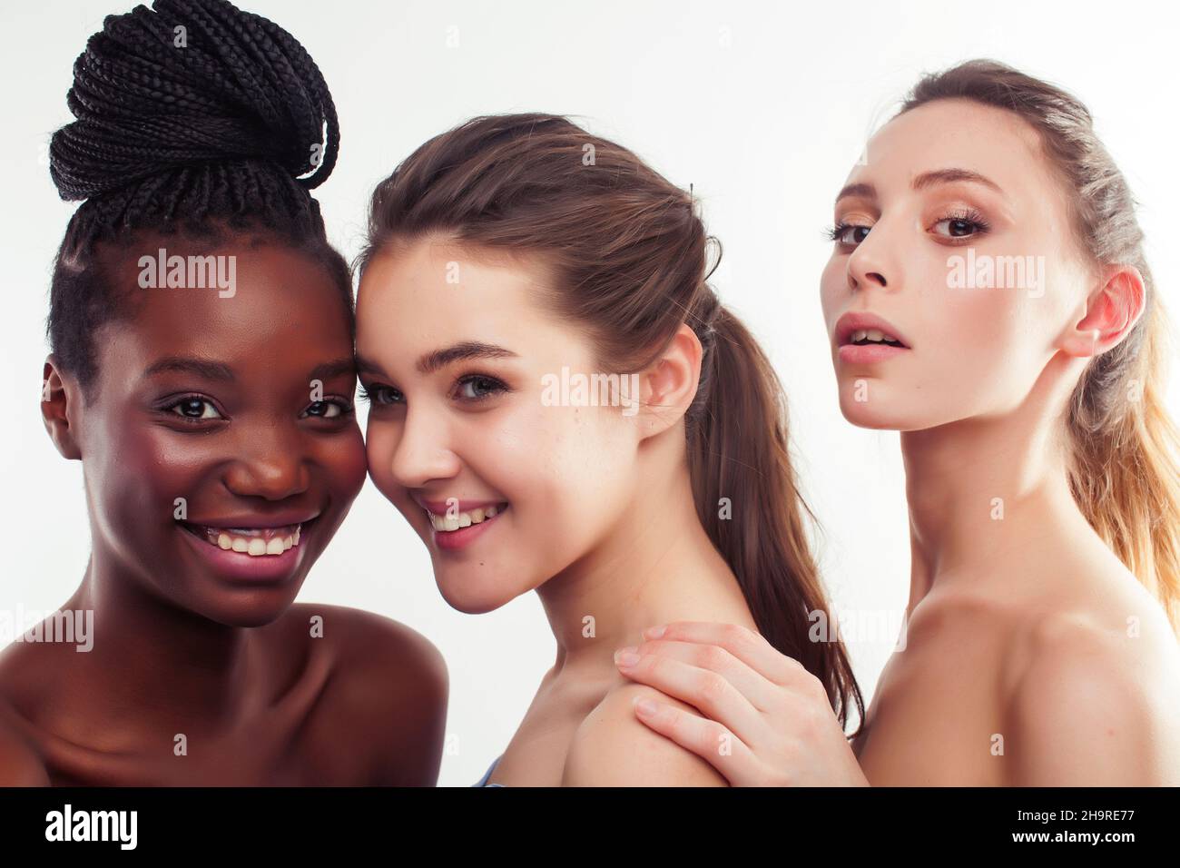 three different nation woman: african-american, caucasian together ...