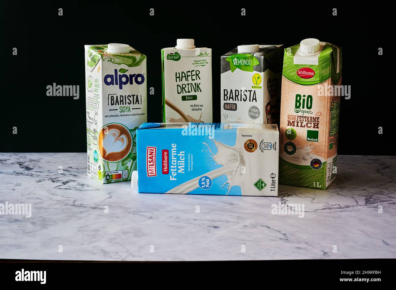 Berlin, Germany - November 25, 2021: View of different packs of milk ...
