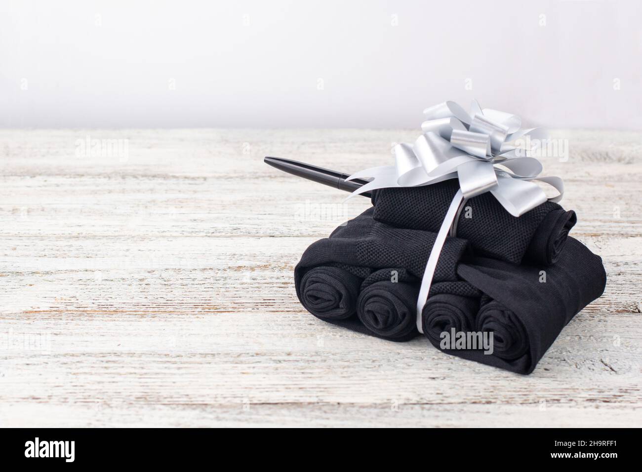 Handmade tanks of socks as gift to men on February 23 on white ...