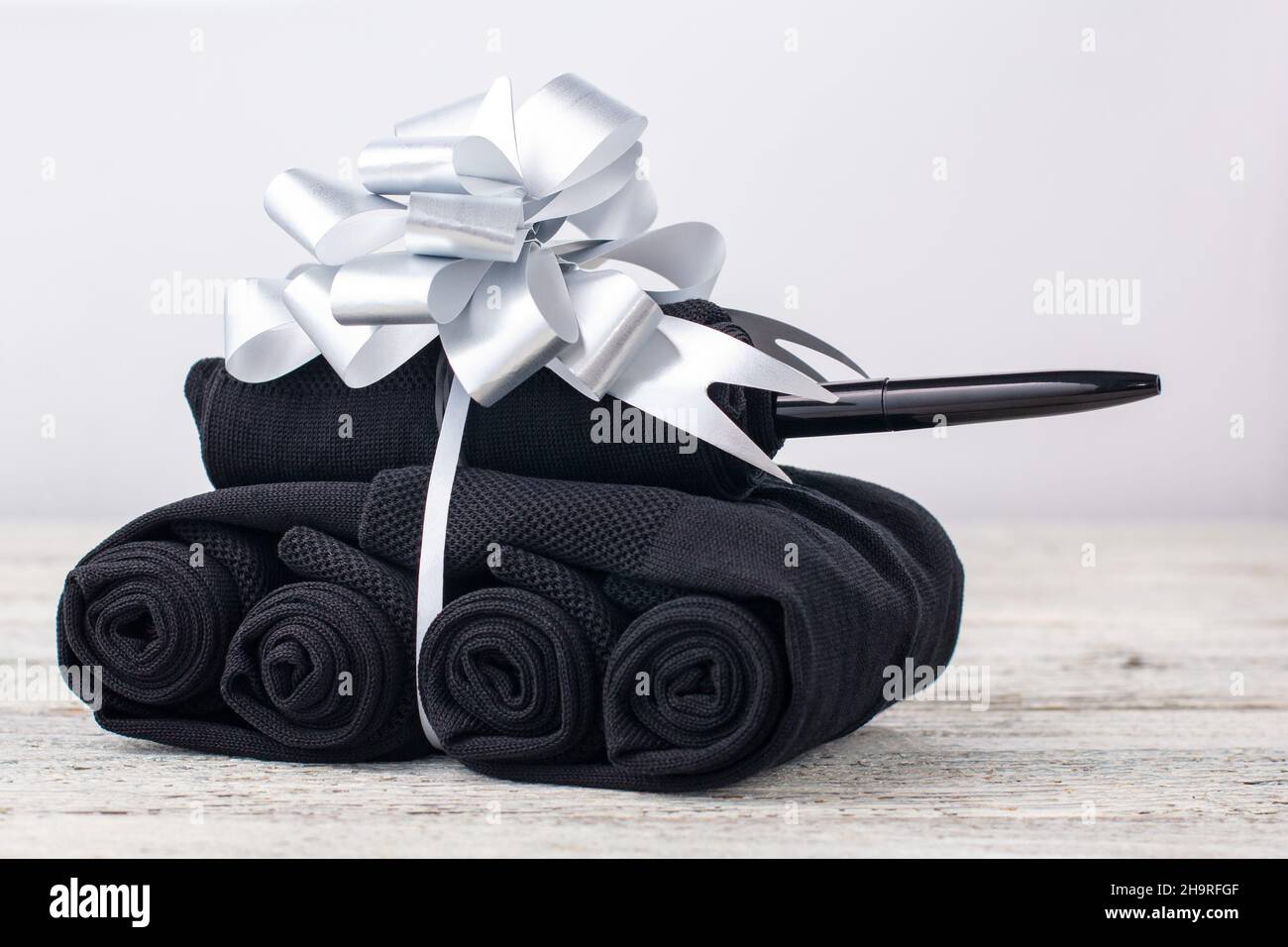 Handmade tanks of socks as gift to men on February 23 on white ...