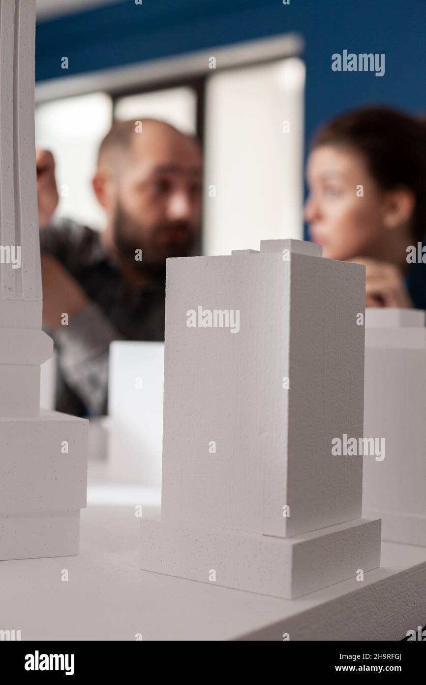 Closeup of white foam architectural scale model of residential building ...