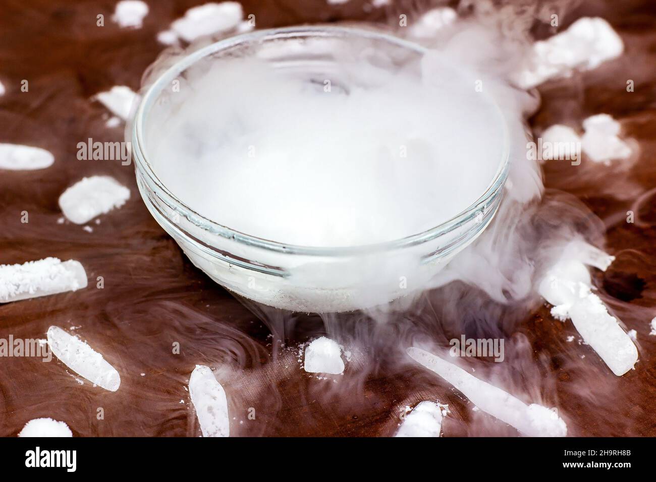 White cool dry ice (frozen carbon dioxide) with smoke effect in the ...