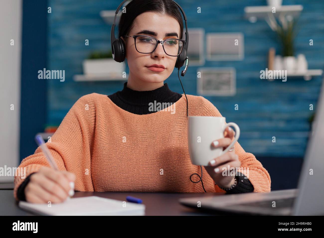 Woman taking notes typing on hi-res stock photography and images - Alamy