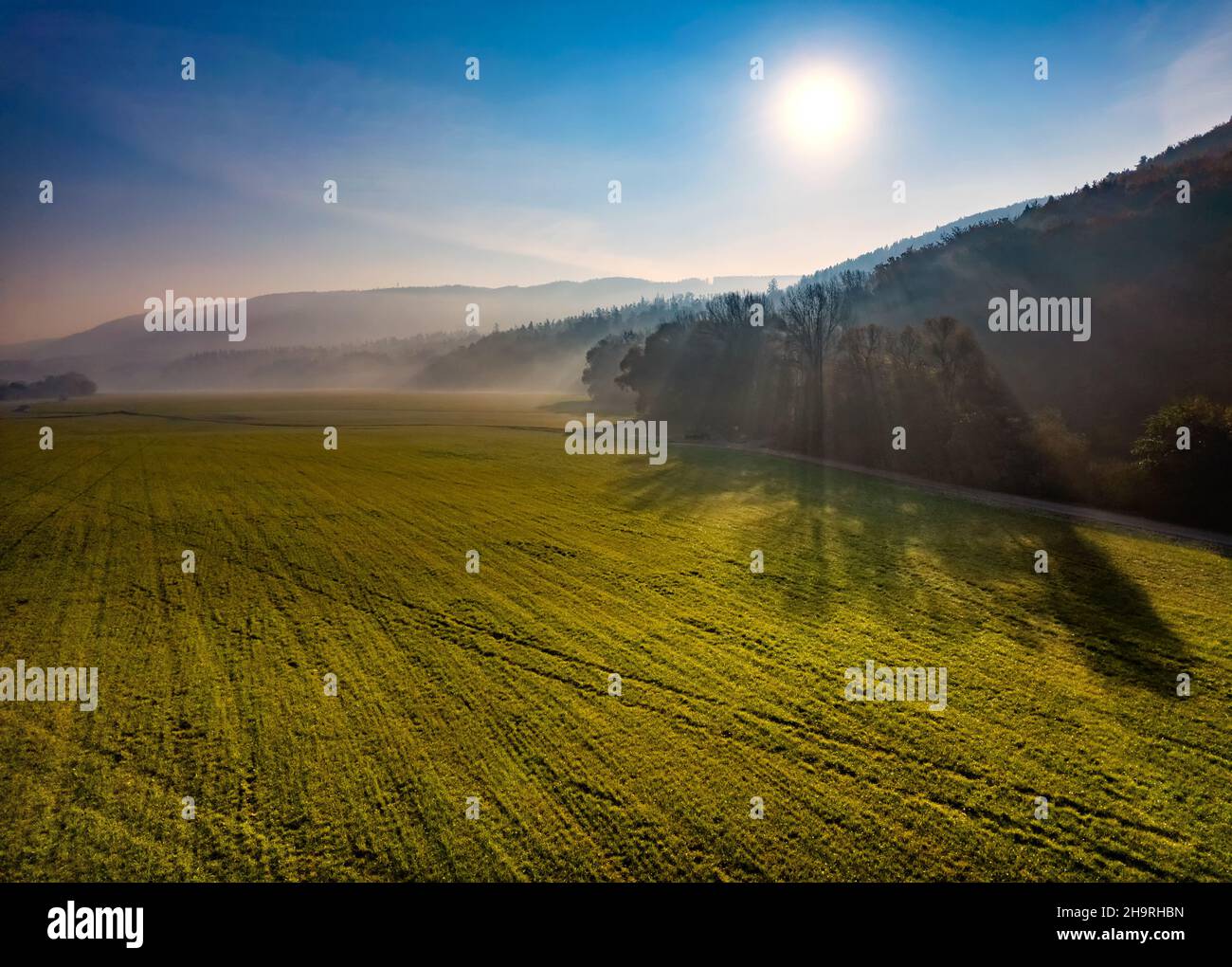 Beaautiful shot of sun rays reflecting on a valley Stock Photo - Alamy