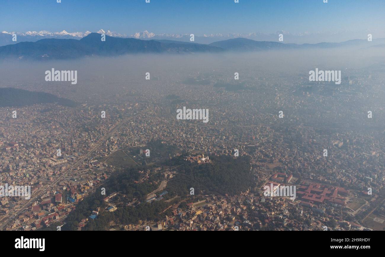 Kathmandu, Nepal. 08th Dec, 2021. (Editors note image taken by a drone)Aerial view of Thick ...