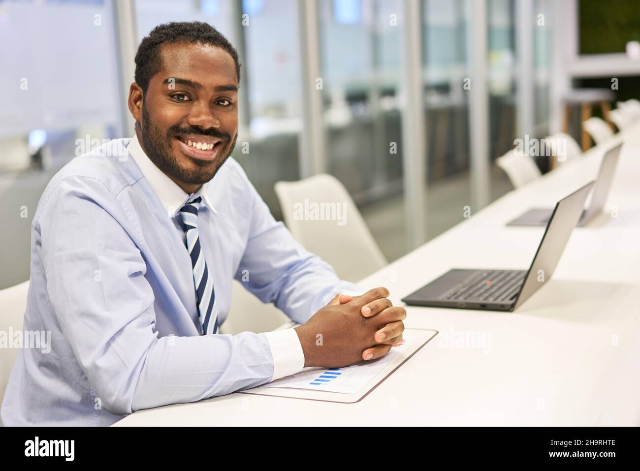 African businessman as a successful business startup founder or ...