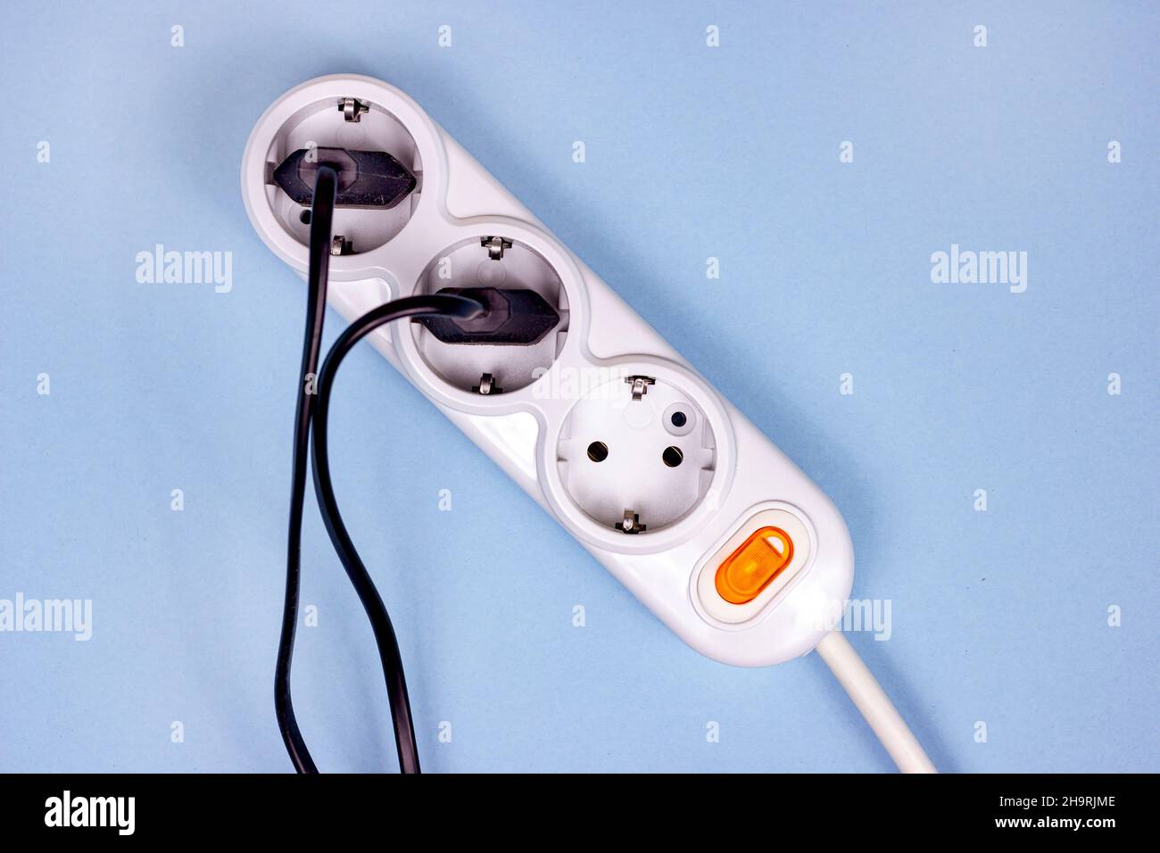 Top view of triple socket European power adapter with different wires ...