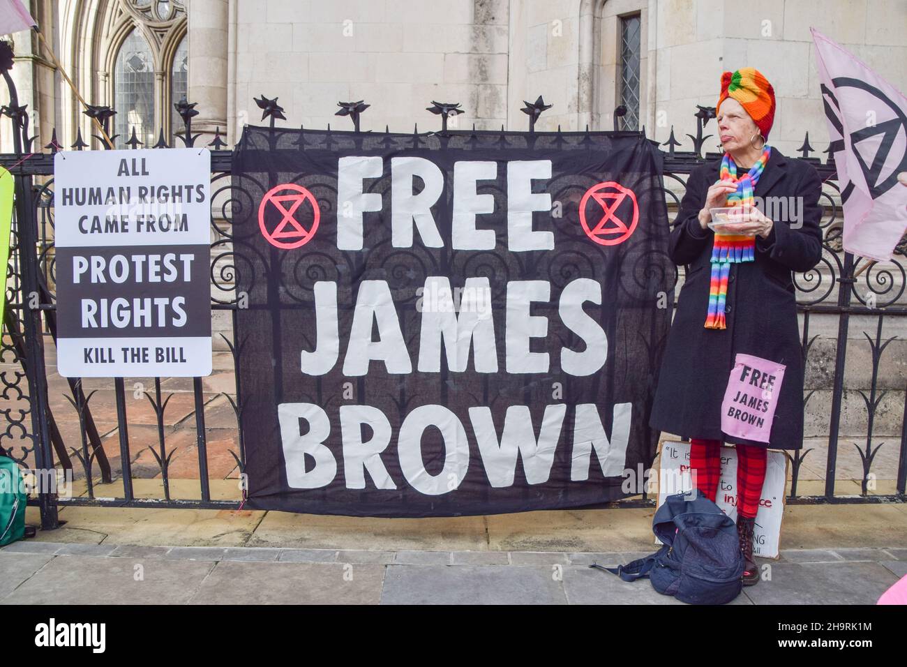 London, UK. 8th December 2021. Activists gathered outside the Royal ...