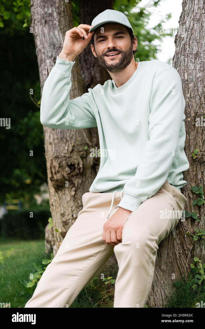 Adjusting cap hi-res stock photography and images - Alamy