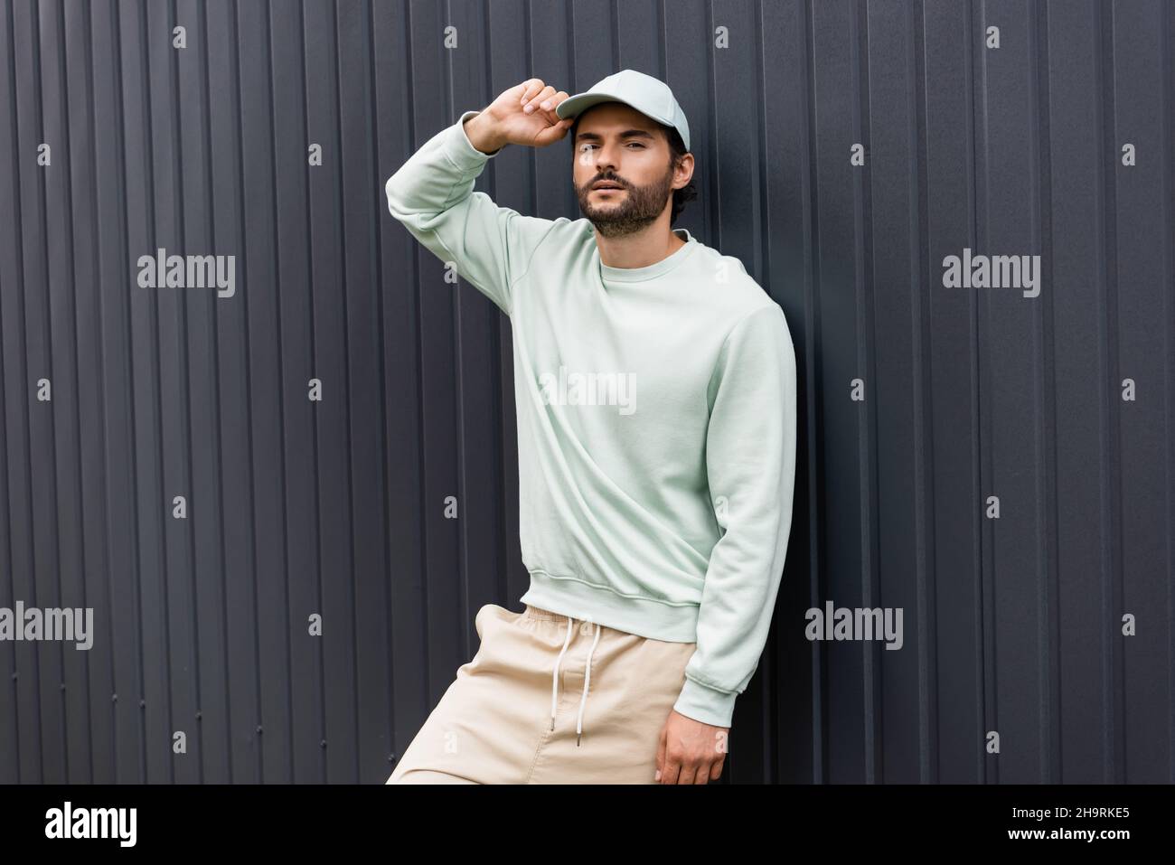 Young man with baseball cap hi-res stock photography and images - Alamy