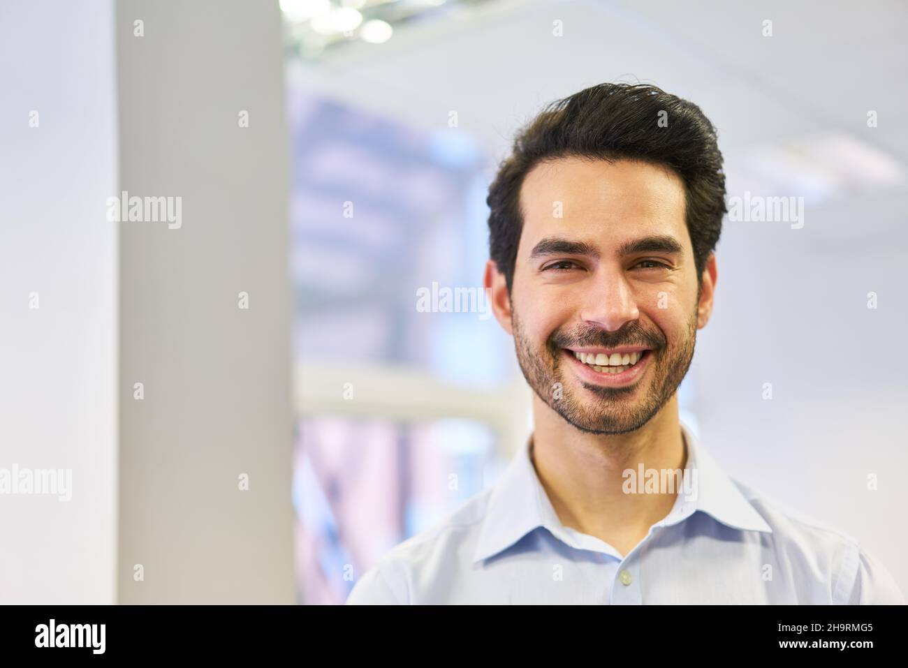 Happy business man as a successful start-up founder or boss in the ...