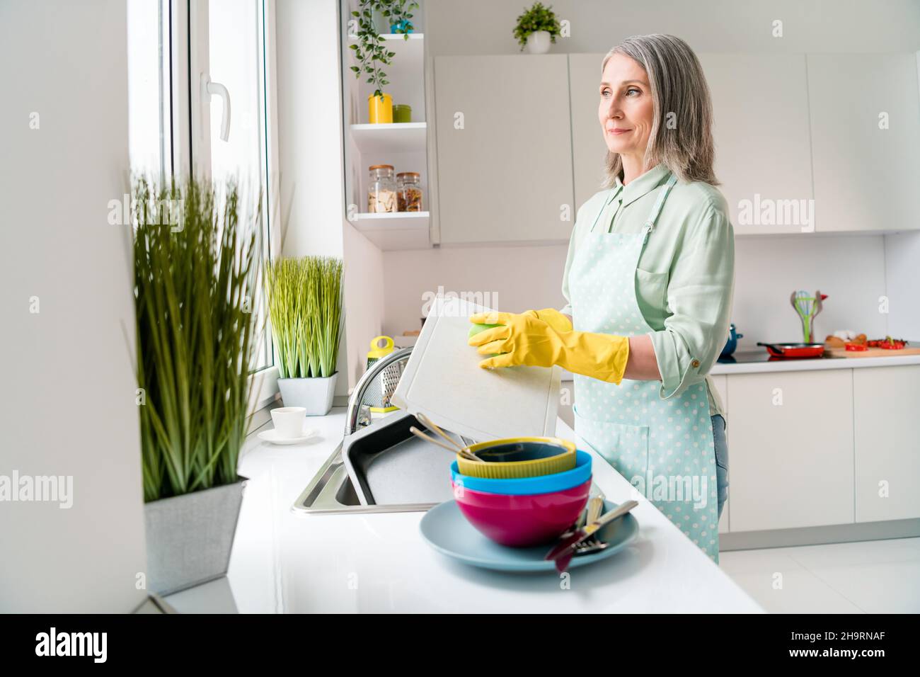 Profile side view portrait of attractive dreamy grey-haired woman doing ...