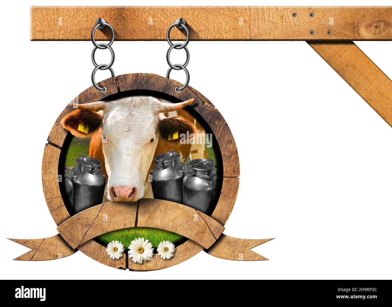 Wooden symbol with head of cow, milk canisters, green grass and three ...