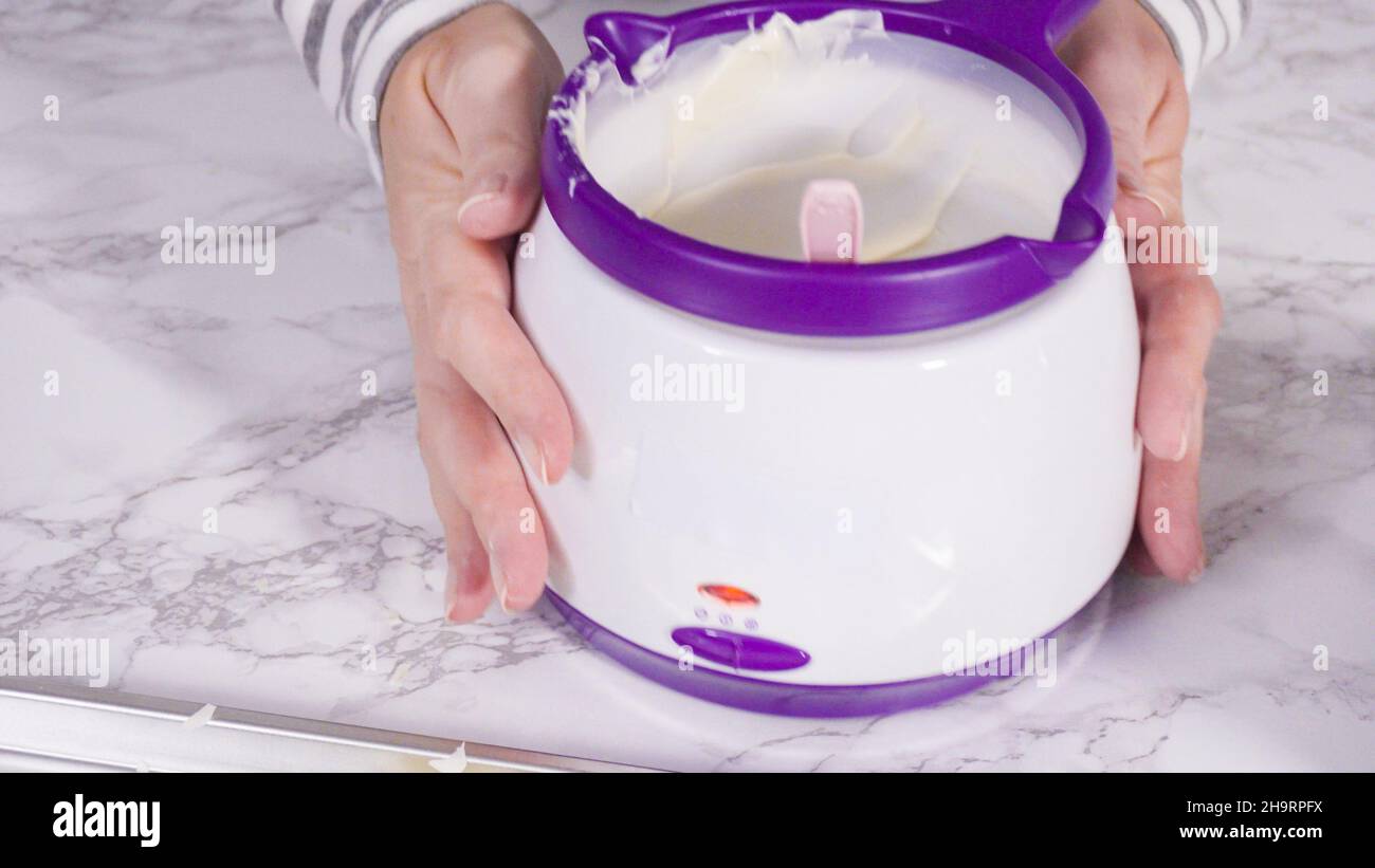 Step by step. Melting chocolate candy melts in an electric candy ...