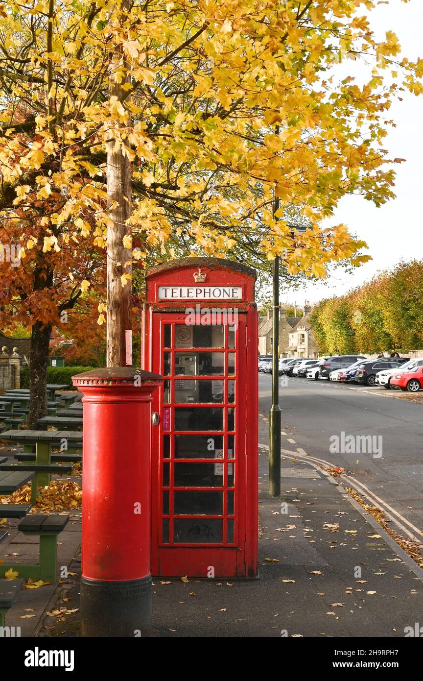 Phone booth and red post box in autumn Stock Photo - Alamy