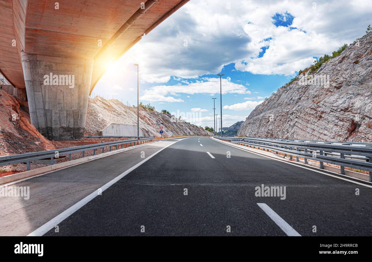 Highway bridge and cars on the road Stock Photo - Alamy